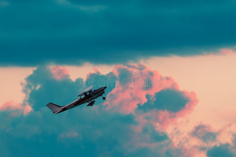 Small plane taking off stock photo. Image of sunset - 194586390