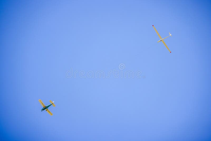 A Small Plane Towing a Glider Stock Photo - Image of wings, plane ...