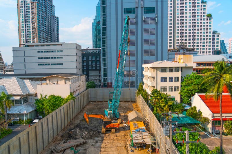 Small Plot of Land in a Cramped Apartment among High-rise Buildings ...