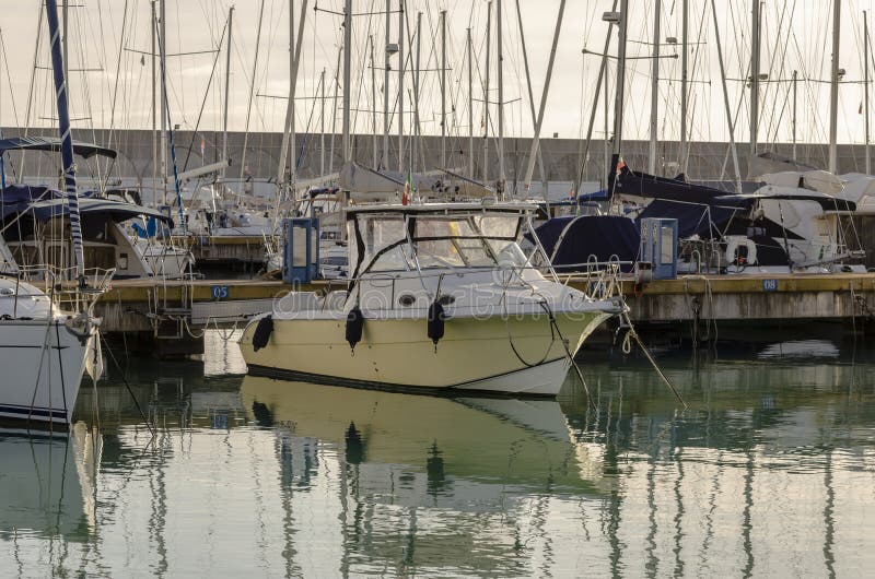 Small Port with Boats and Reflections at Sunset Stock Image - Image of ...