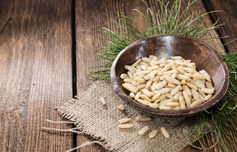 Small portion of Pine Nuts stock image. Image of seasoning - 44118189