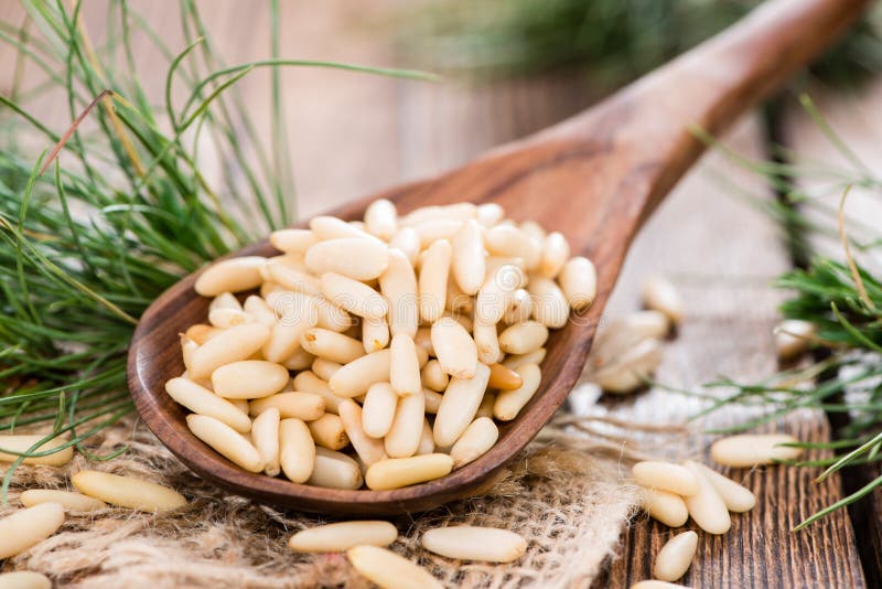 Small portion of Pine Nuts stock image. Image of dietary - 44646737