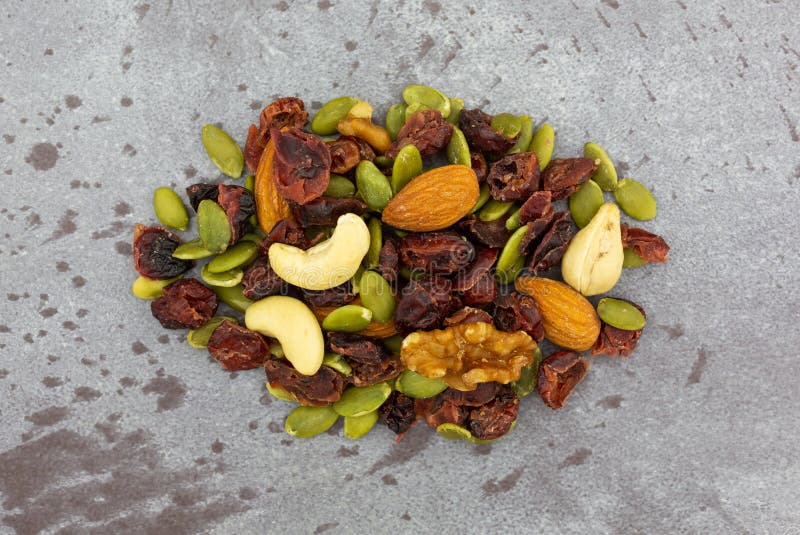 Small Portion of Seeds, Nuts and Fruit on a Gray Background Top View ...