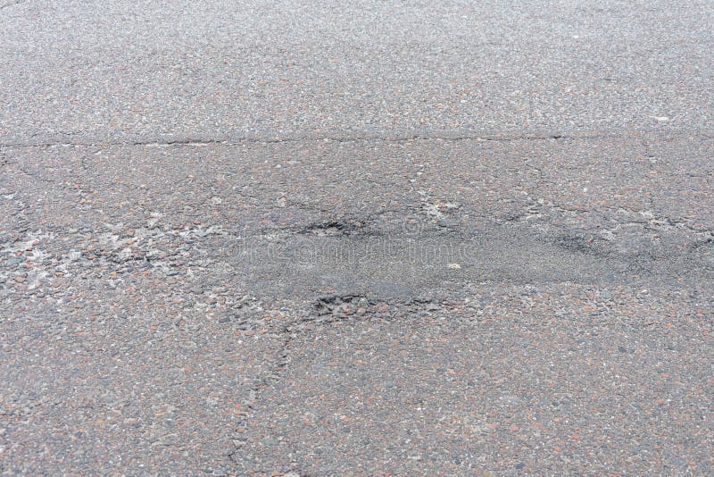 Small Potholes on the Asphalt Road, Pits and Destroyed Road Surface ...