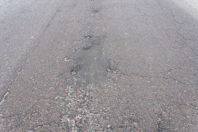 Small Potholes on the Asphalt Road, Pits and Destroyed Road Surface ...