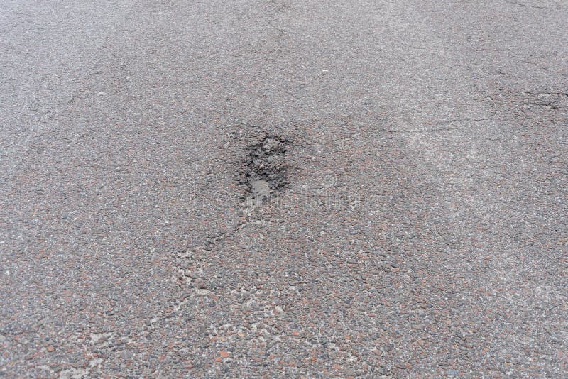 Small Potholes on the Asphalt Road, Pits and Destroyed Road Surface ...