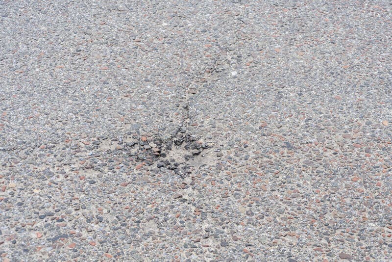 Small Potholes on the Asphalt Road, Pits and Destroyed Road Surface ...