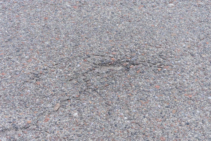 Small Potholes on the Asphalt Road, Pits and Destroyed Road Surface ...