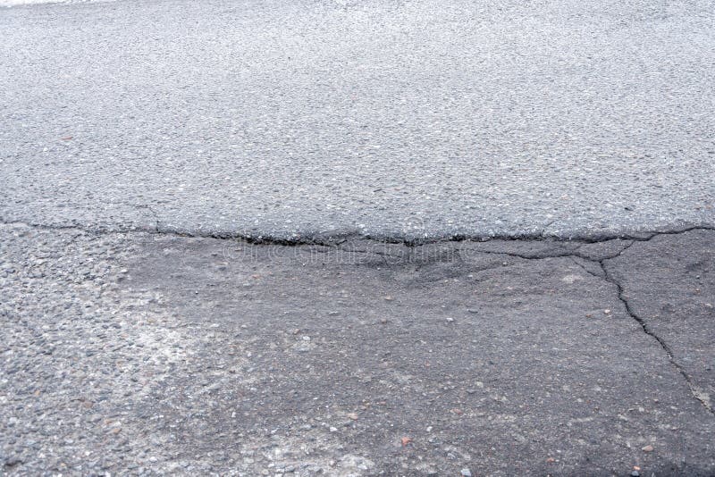 Small Potholes on the Asphalt Road, Pits and Destroyed Road Surface ...