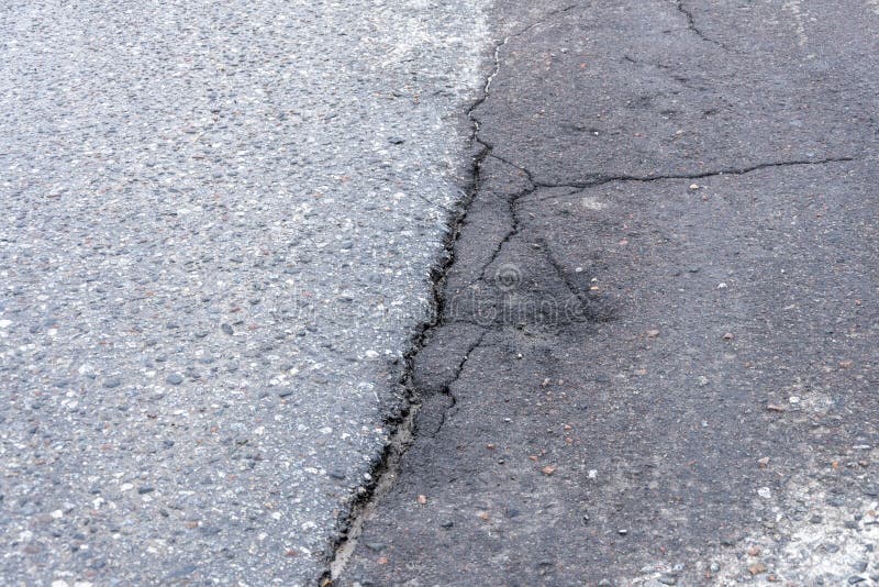 Small Potholes on the Asphalt Road, Pits and Destroyed Road Surface ...
