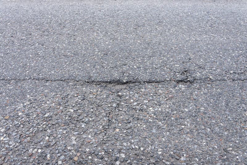 Small Potholes on the Asphalt Road, Pits and Destroyed Road Surface ...