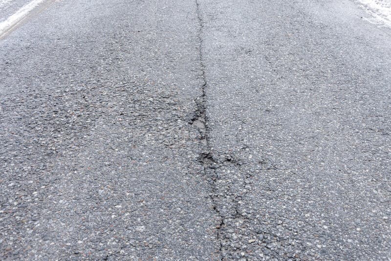 Small Potholes on the Asphalt Road, Pits and Destroyed Road Surface ...