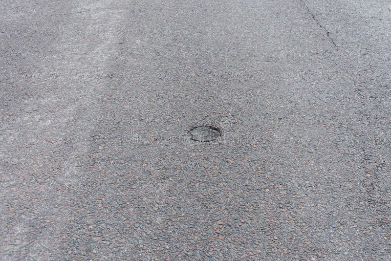 Small Potholes on the Asphalt Road, Pits and Destroyed Road Surface ...