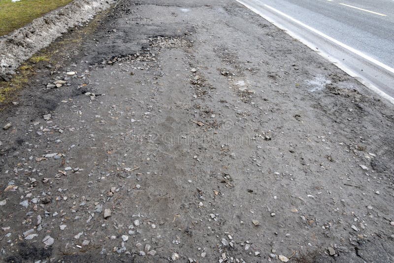 Small Potholes on the Asphalt Road, Pits and Destroyed Road Surface ...