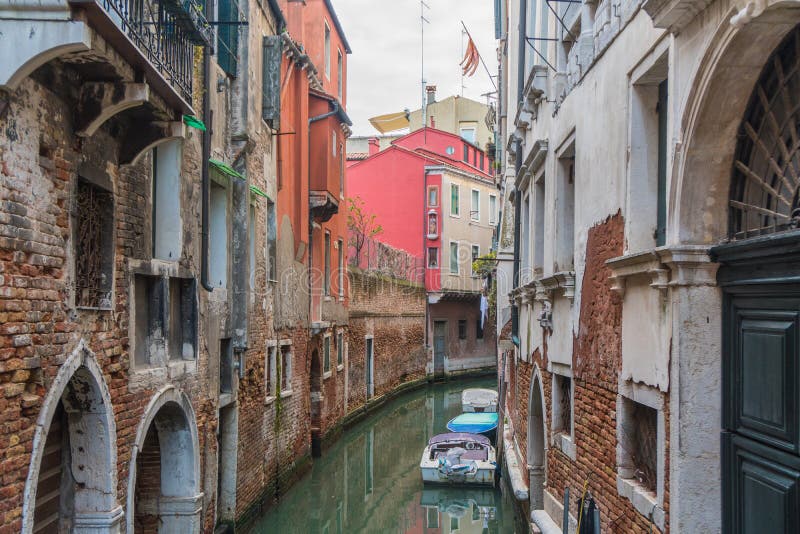 Small canal in Venice stock photo. Image of building - 113450120