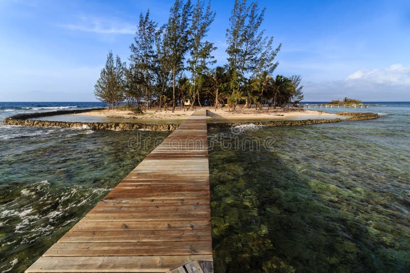 Dock on Tropical Island and Turquoise Waters Stock Image - Image of ...