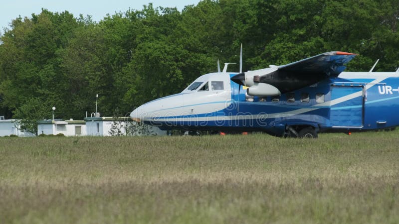 Small Old Propeller Plane is Moving Towards the Runway in Field for ...