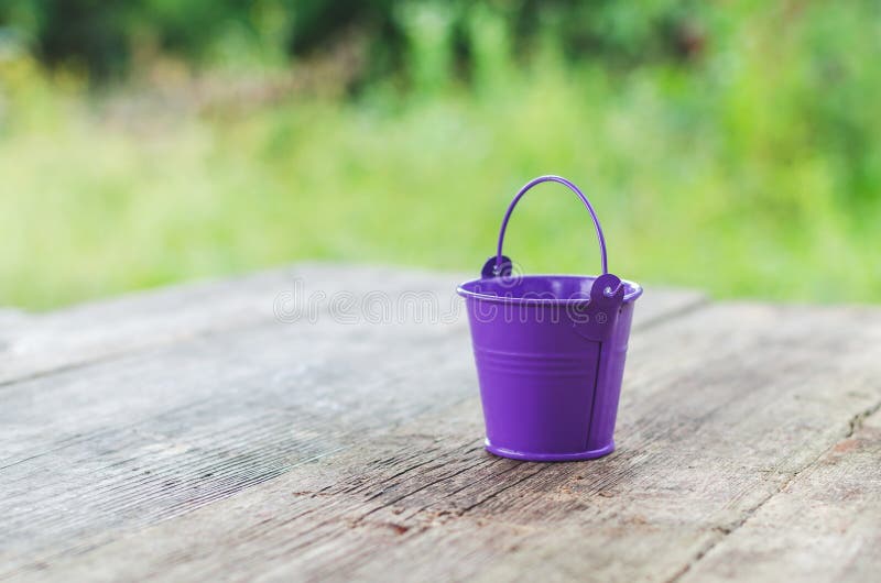Purple bucket and spade stock image. Image of beach, rocks - 8917869