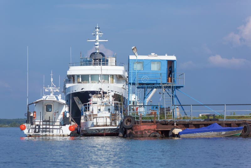 Small Quay on an Artificial Lake in the Mountains Stock Photo - Image ...