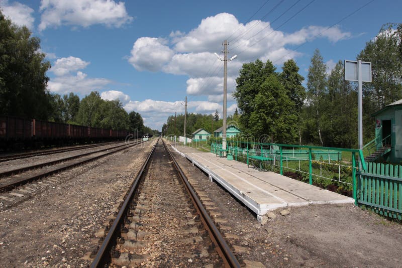 A small railway station stock photo. Image of clouds - 14939696