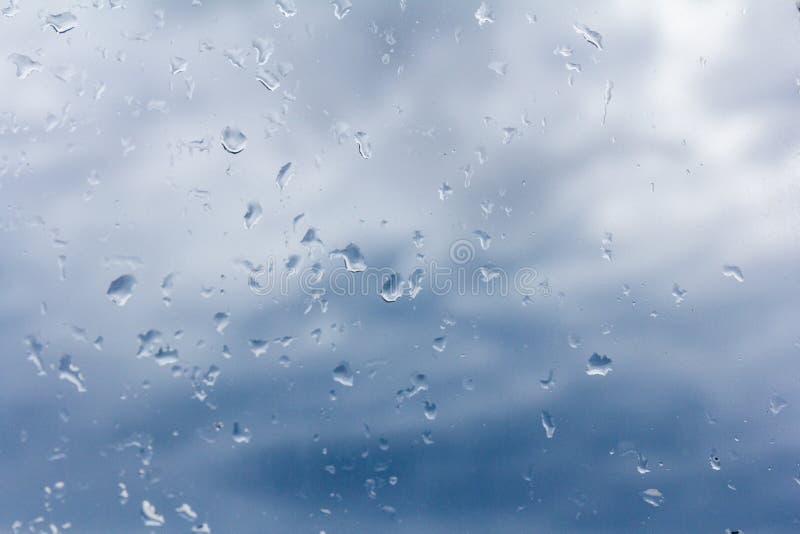 A Small Raindrop Rests on the Glass after Rain Stock Image - Image of ...