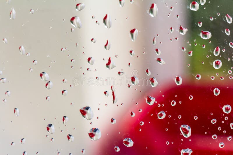A Small Raindrop Rests on the Glass after Rain Stock Photo - Image of ...