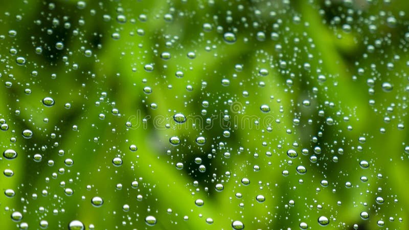 The Small Raindrops on the Window Glass in the Rainy Season Intersect ...