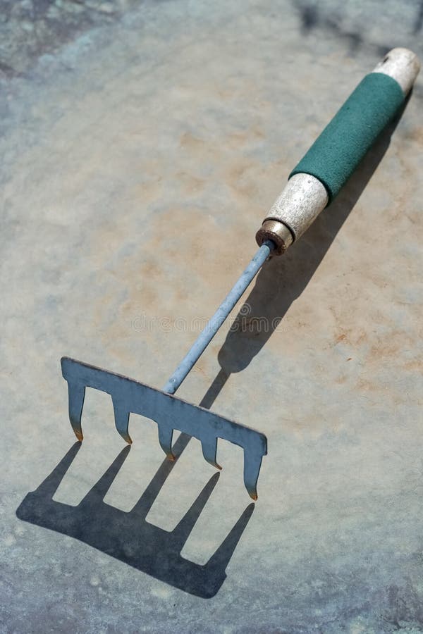 A small rake. stock image. Image of outdoor, short, ground - 98291577