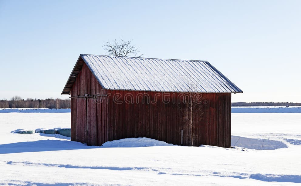 A Small Red Barn in a Sunny Winter Landscape Stock Photo - Image of ...