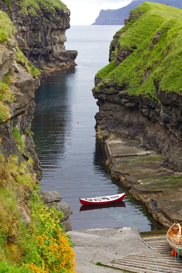 Narrow channel with boat stock image. Image of entrance - 137739307