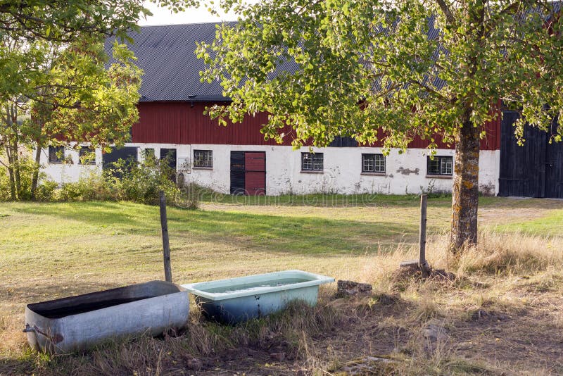 A small red farmhouse stock photo. Image of stonehouse - 84181184
