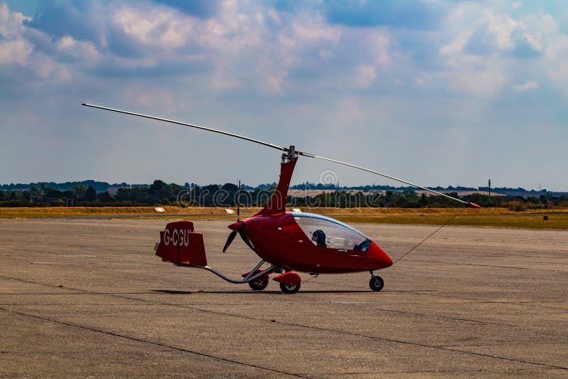 A small red helicopter editorial photography. Image of chopper - 122458797