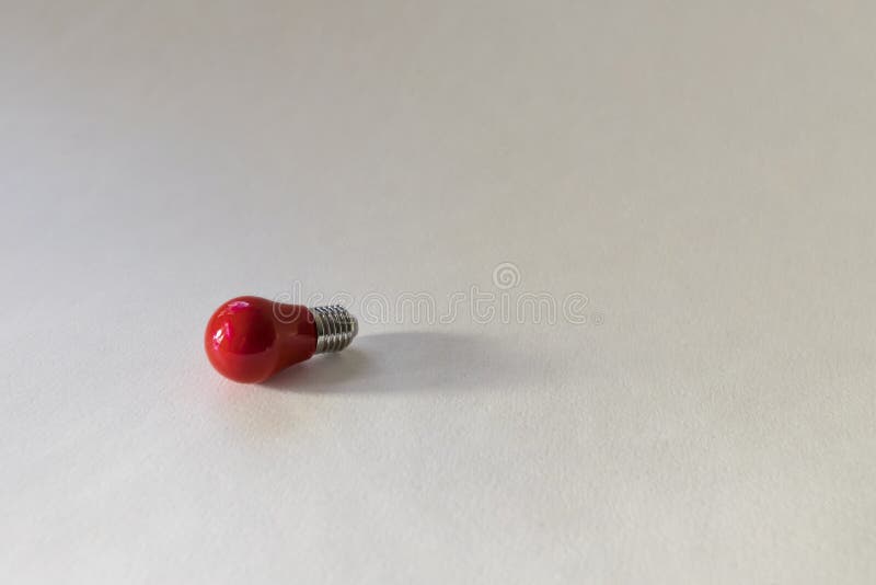 Small Red Light Bulb Top View on White Background Stock Image - Image ...