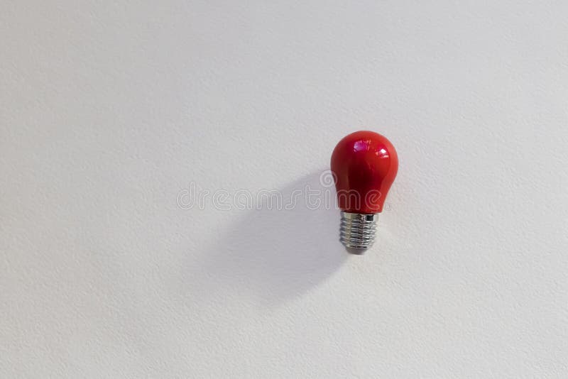 Small Red Light Bulb Top View on White Background Stock Photo - Image ...