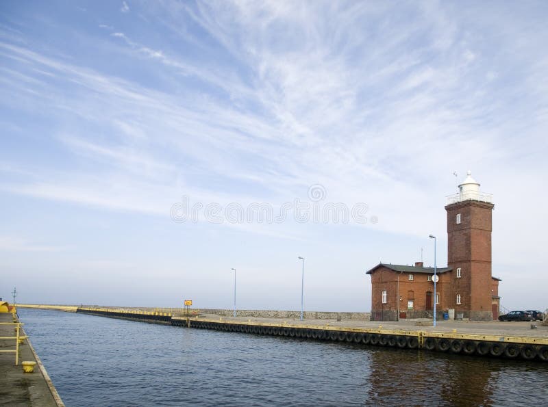 Small red lighthouse. stock photo. Image of cloud, cloudy - 2058474