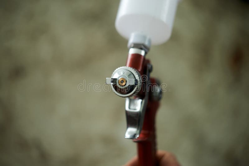 Small Red Spray Gun in Human Hand Stock Photo - Image of mechanic ...