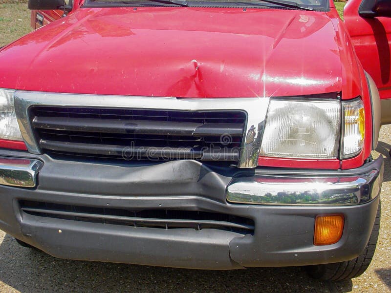 Small Red Vehicle Involved in Front End Collision with Pole or Tree ...