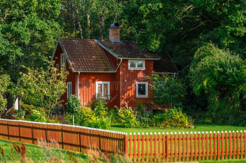 Small Red Wooden House in a Forest Clearing.. Stock Photo - Image of ...