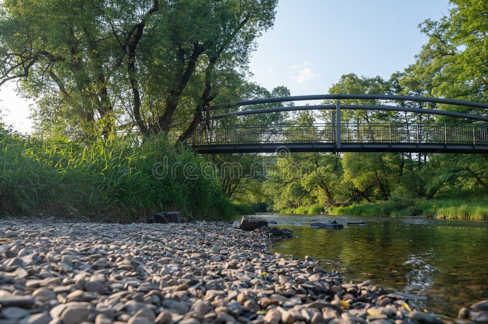A Small River from the Bank, with a Bridge Stock Image - Image of ...