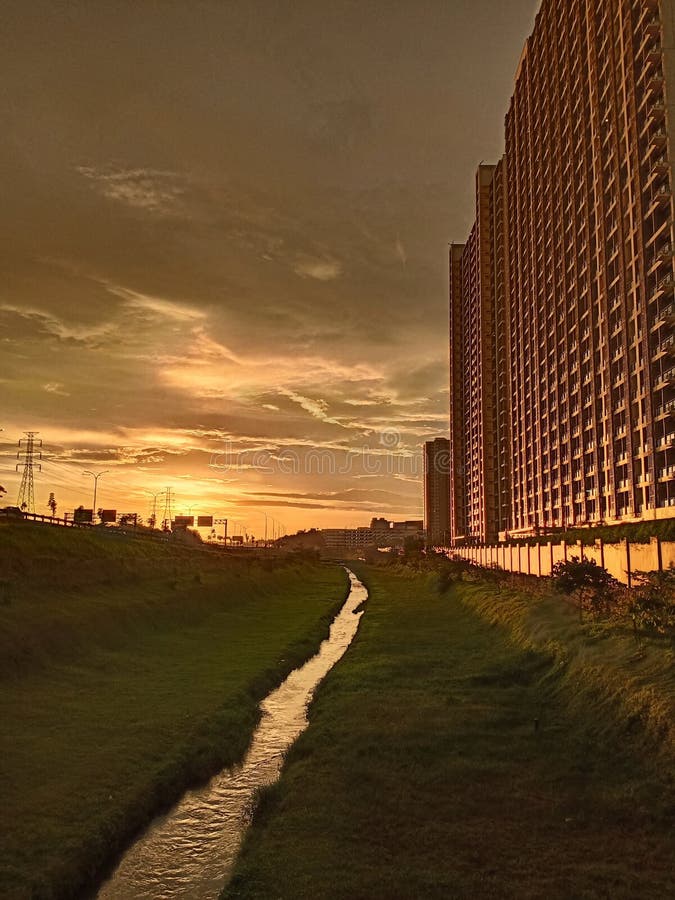 Small River and Buildings in the Evening Stock Image - Image of ...