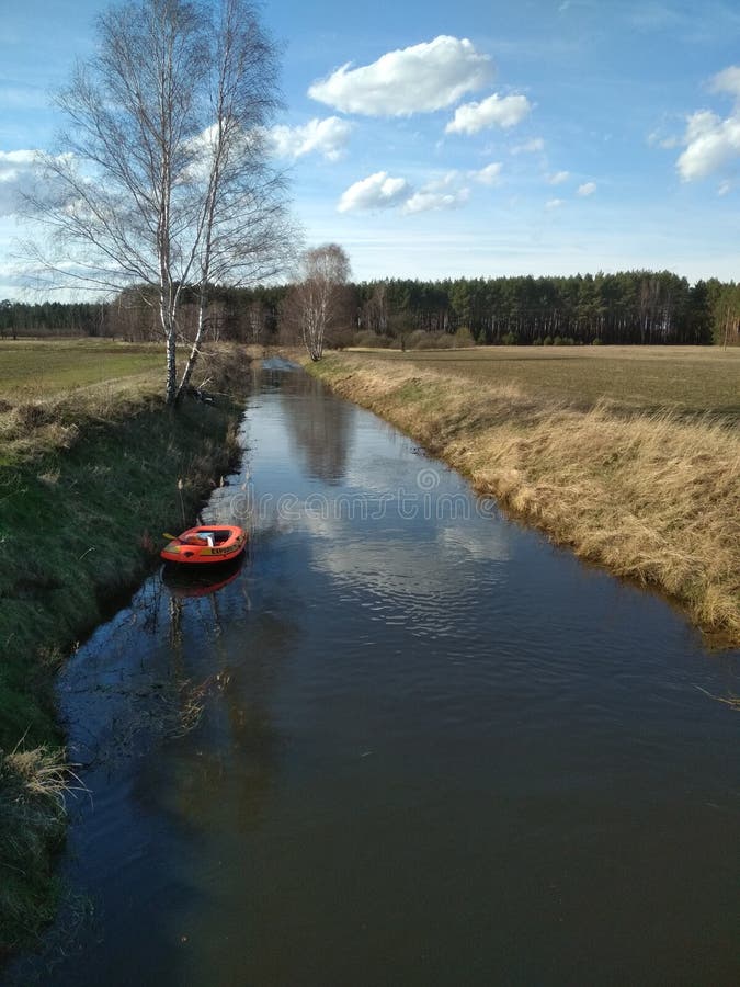 Small river between fields stock image. Image of ponton - 156413915