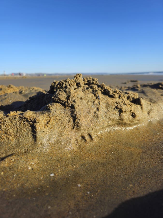Small River Flows through a Sand Mountain at a Beach Stock Photo ...