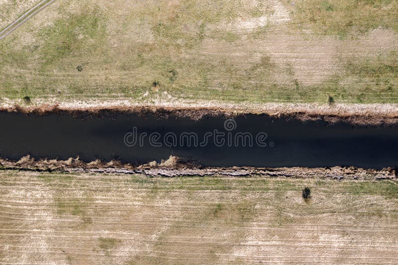 A Small River, a Sand Ditch between the Fields and the Thickets Seen ...