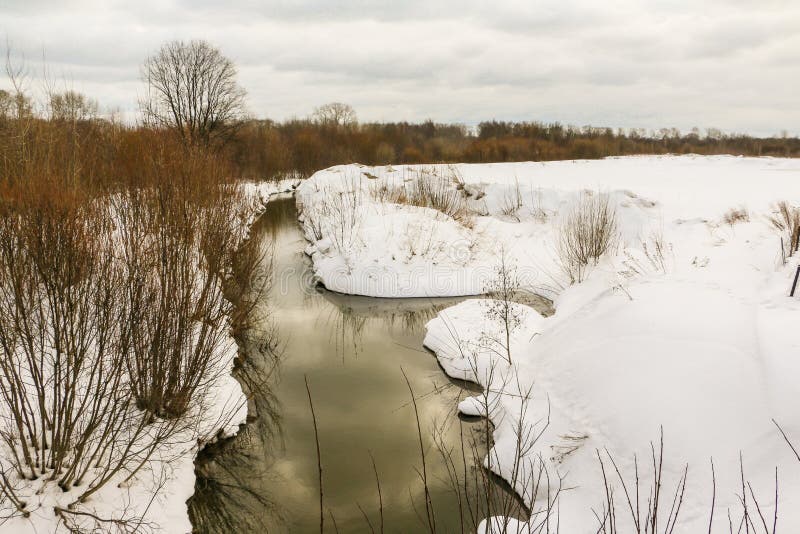 Small River in Snow in a Spring Day Stock Photo - Image of snow, water ...