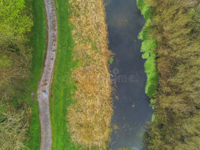 Small River and Walking Path in a Park, Aerial Top Down View Stock ...