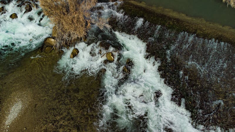 Caudal de rio con cascada stock image. Image of green - 241558259