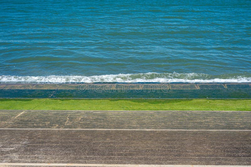 Small River Waves Crashing on a Smooth Cement Surface with Green Moss ...