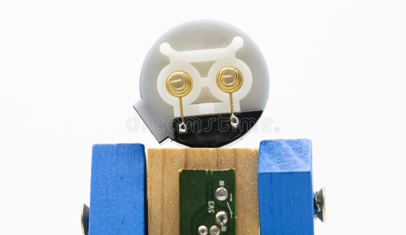 Small Robot Made with Wood, Screws and Parts of Electronics Parts Stock ...