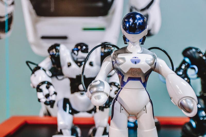 Small Humanoid Robots at a High Technology Exhibition. High Tech ...