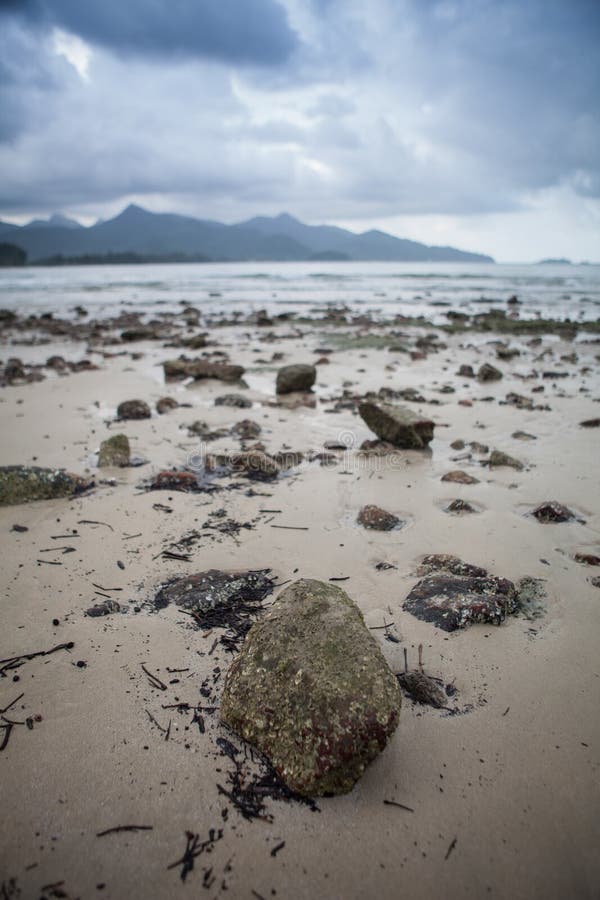 Small rocks at the beach stock photo. Image of texture - 97870762